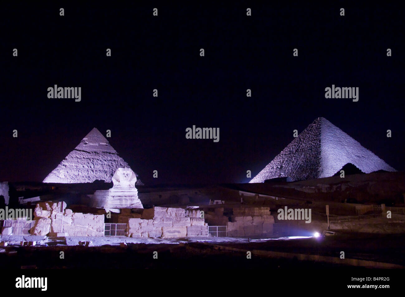 The pyramids of Giza and sphinx illuminted with lights during the sound ...