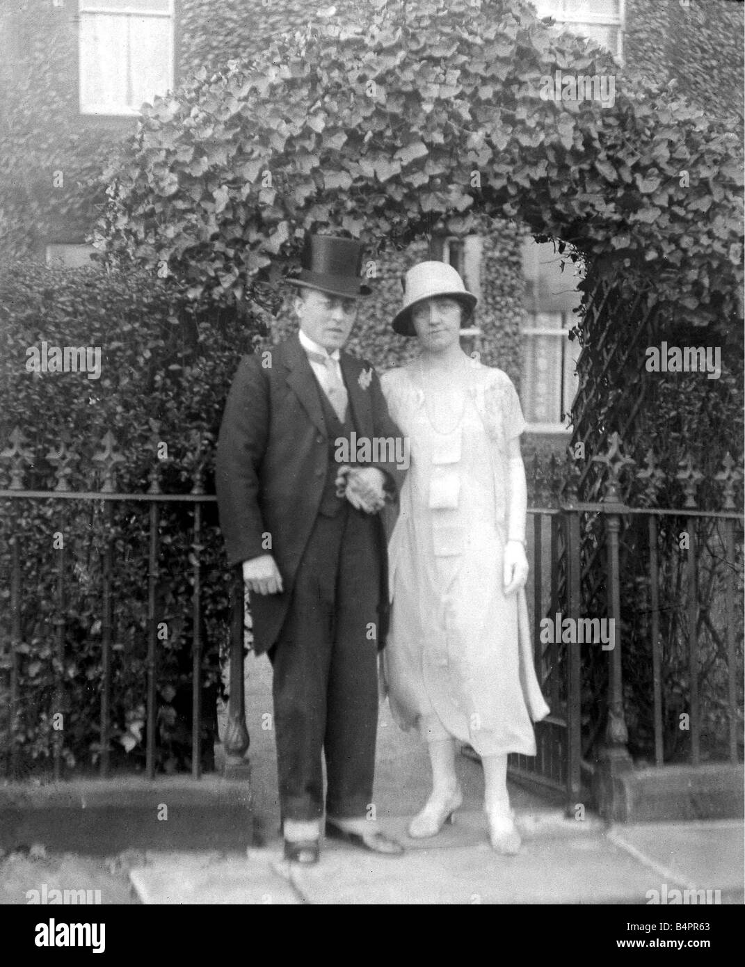 A gentleman and lady ready for a wedding c 1925 Stock Photo - Alamy