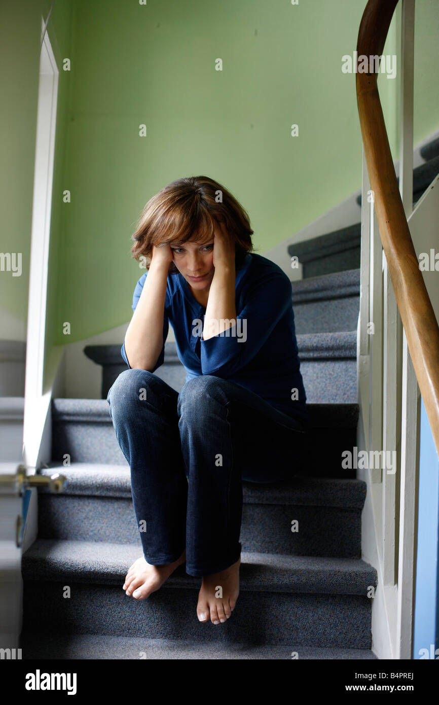 Sitting mournfully hi-res stock photography and images - Alamy