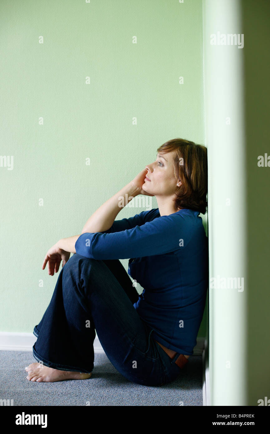 Sitting mournfully hi-res stock photography and images - Alamy