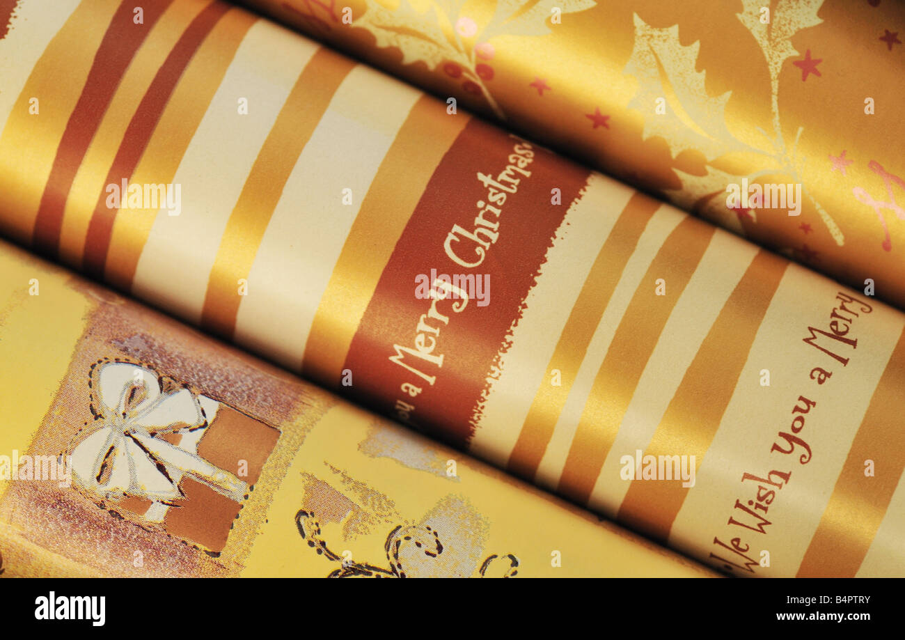 Rolled Christmas wrapping paper Stock Photo - Alamy