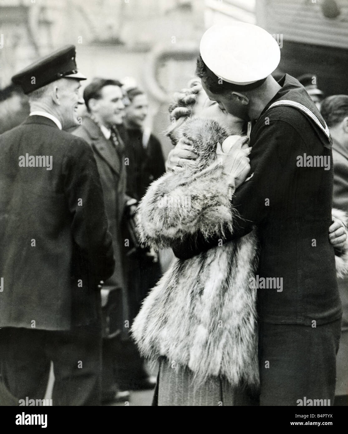 K Rhodder of Weymoutha repatriated POW from HMS Exeter kissing his ...
