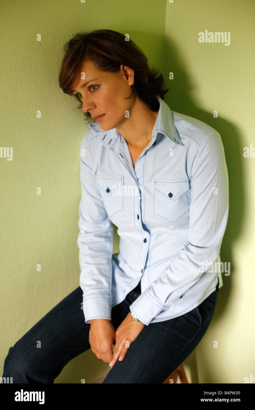 Sitting mournfully hi-res stock photography and images - Alamy