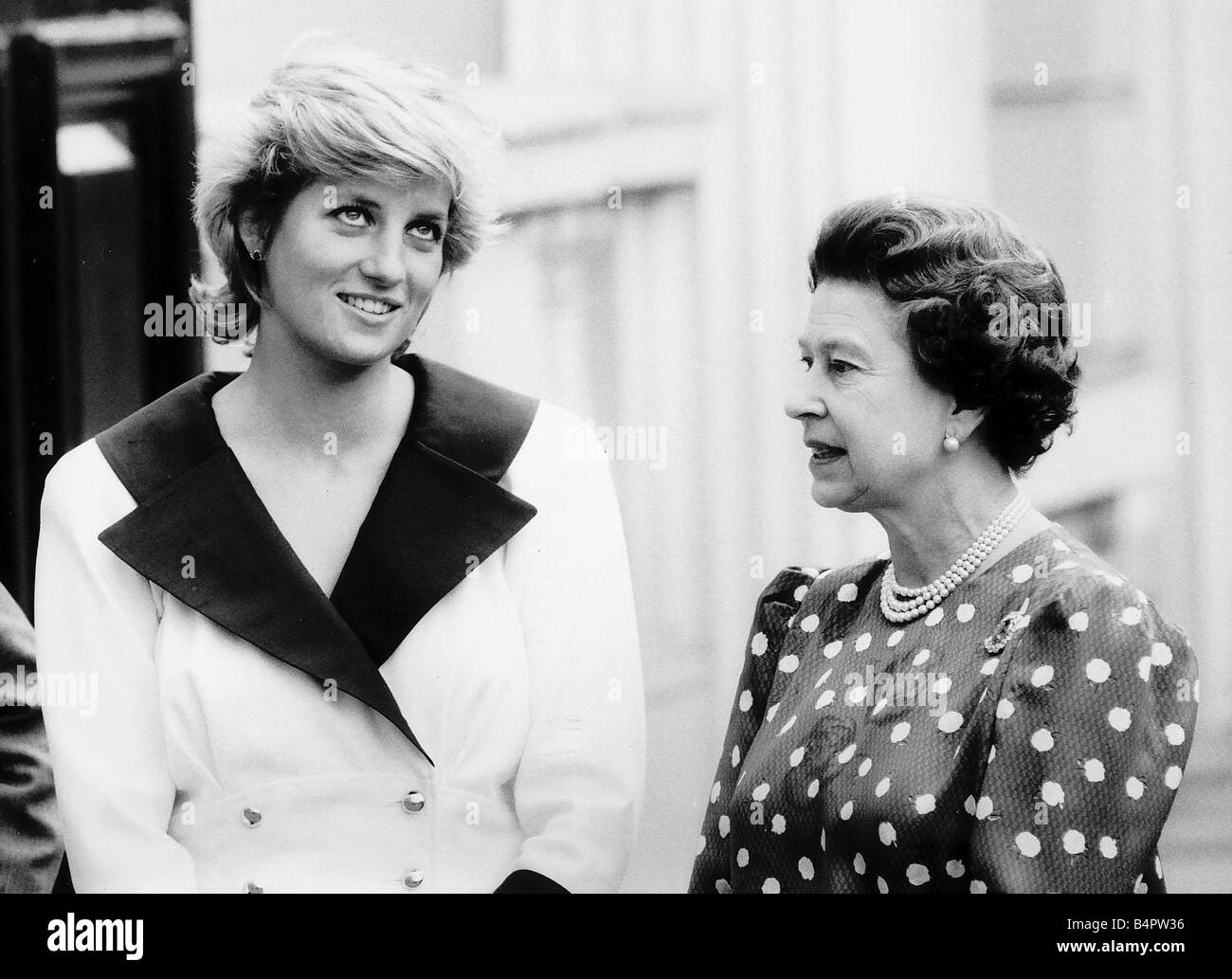The Queen and Princess Diana talk outside with Princess Diana Stock ...