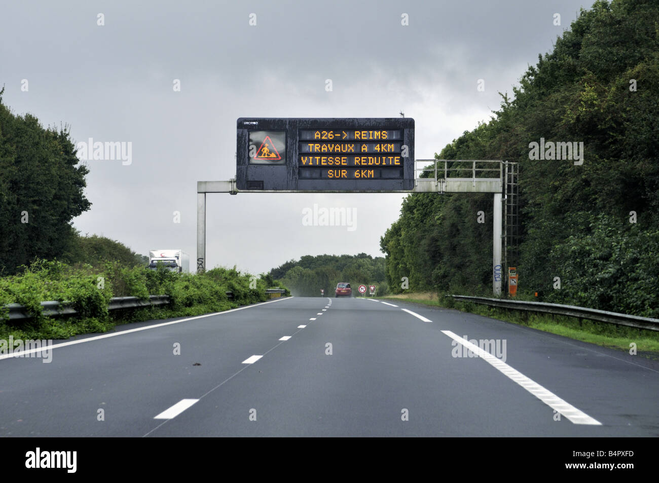 French A26 motorway electronic board warning to reduce speed because of ...