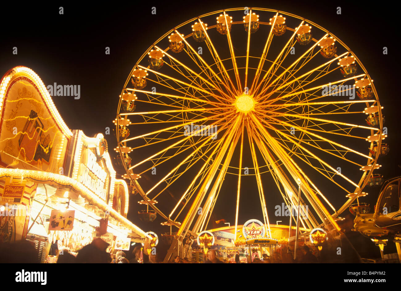 Bright dark darkness evening funfair illuminated kermis light lit ...