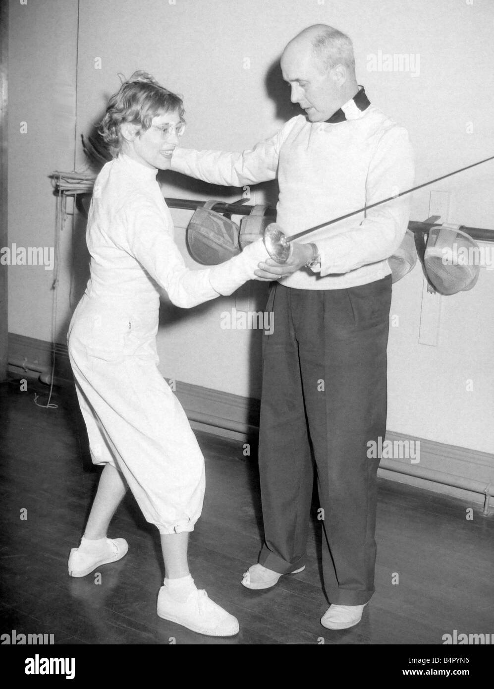 Monsieur Henri Faubert fencing instructor gives a valuable tip to ...