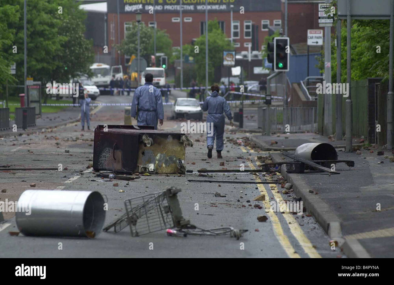 Scene of crime police survey damage caused rioting youths in Glodwick ...