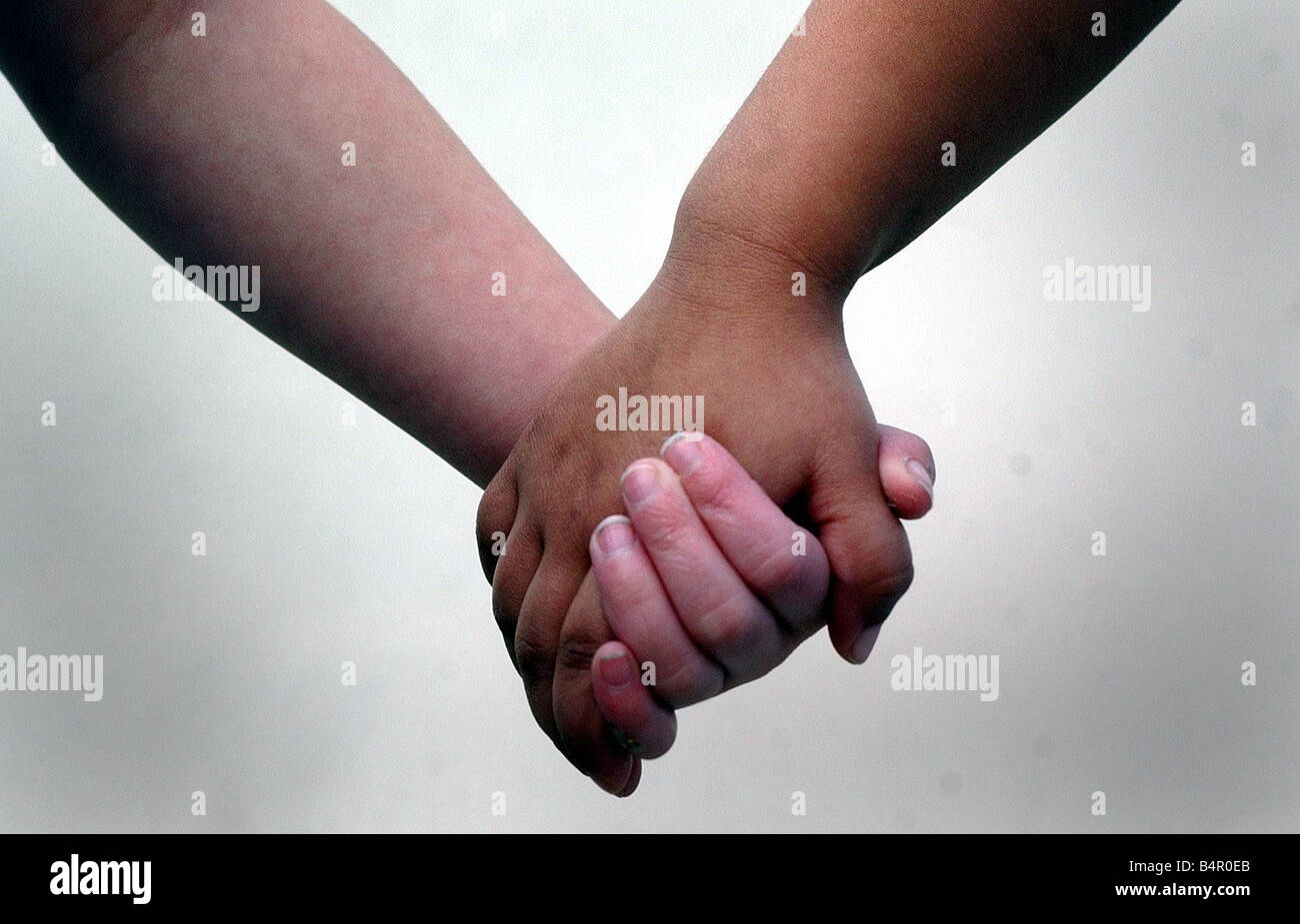 Nursery kids hold hands Stock Photo - Alamy