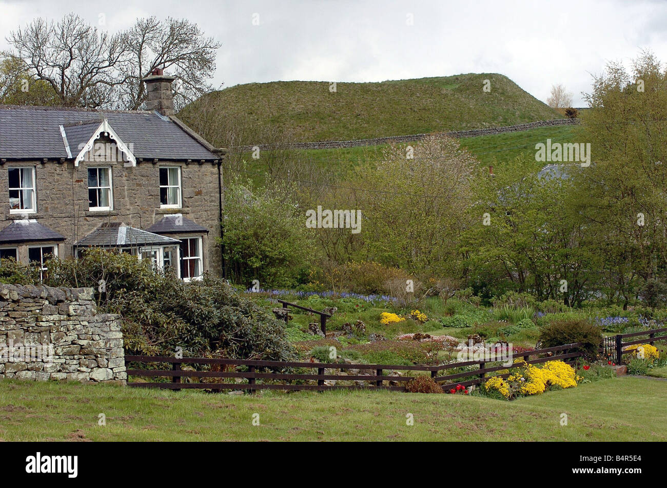The mound in Elsdon which is the site of ther former castle Stock Photo ...