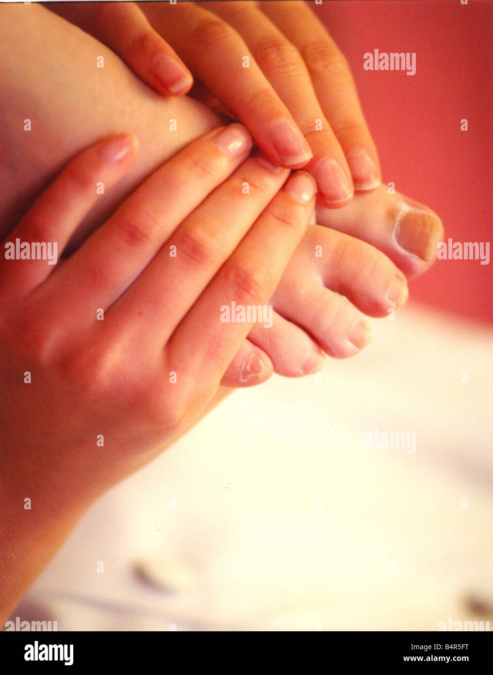 A foot being massaged Stock Photo - Alamy