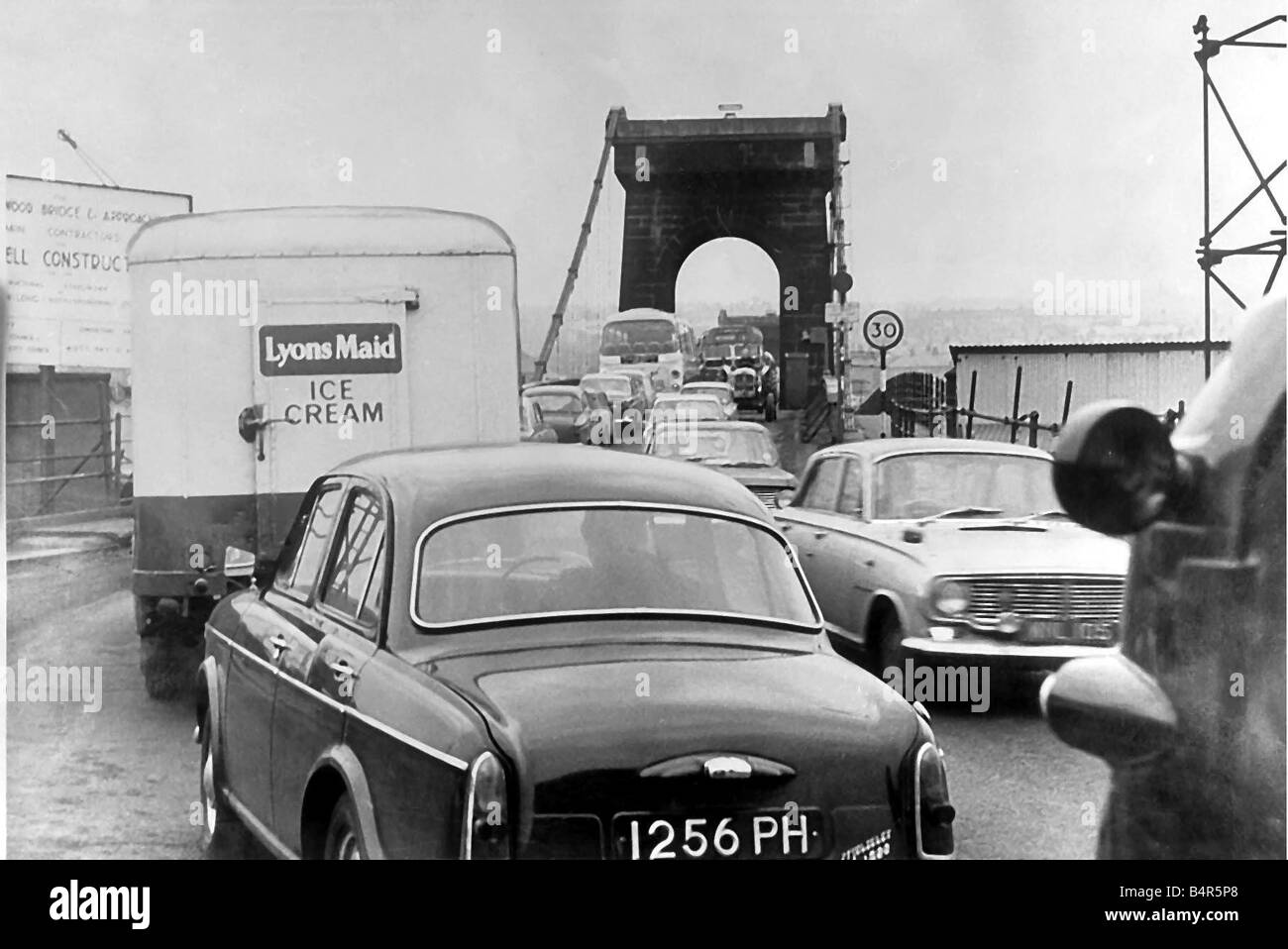 A queue of traffic at the old Scotswood Bridge c 1966 Stock Photo - Alamy