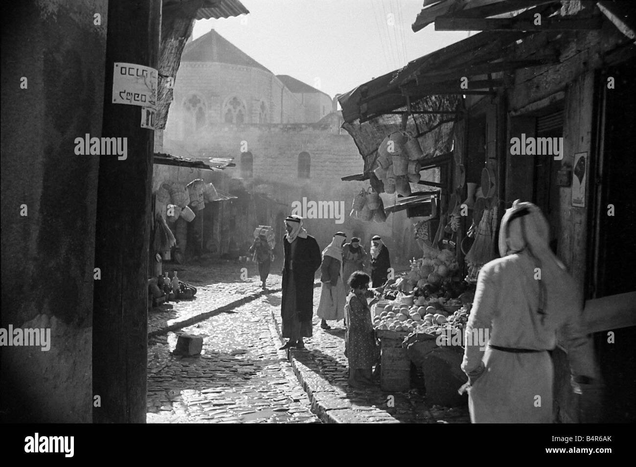 Shops line a Nazareth street in Palestine Circa 1935 Stock Photo - Alamy