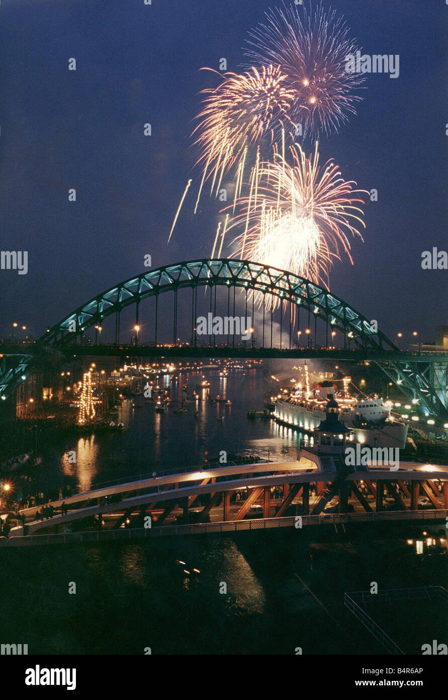Fireworks on the Tyne Bridge and the Swing Bridge 01 01 2000 Stock ...