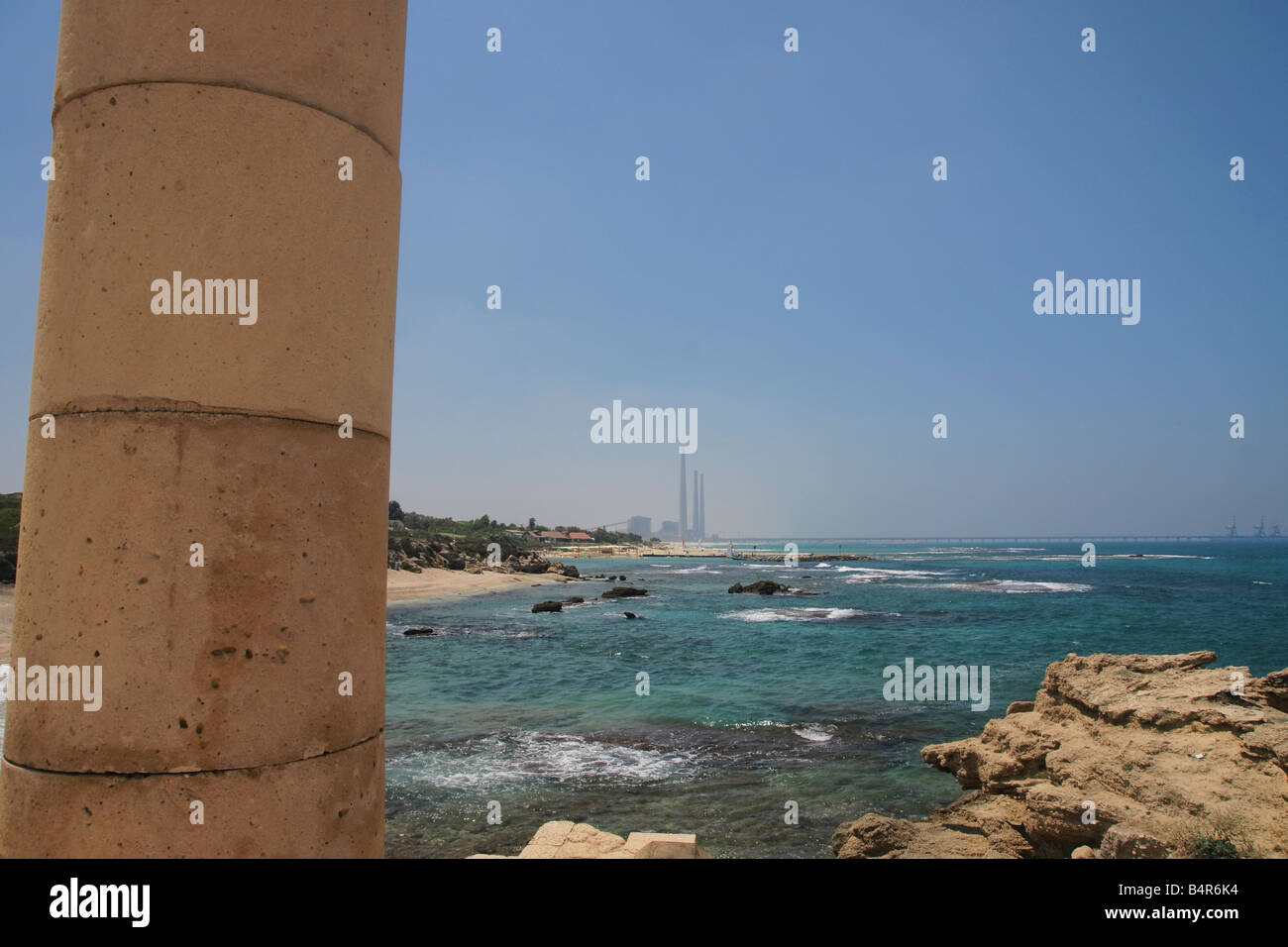 Caesarea, Israel. An ancient Roman pillar overlooking the Hadera Power ...