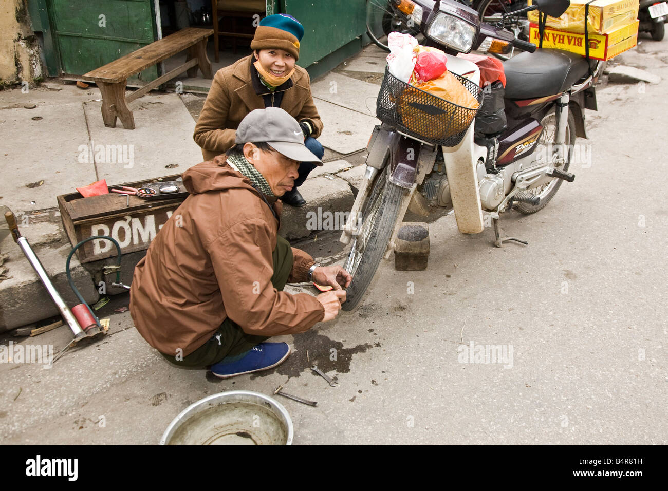 Motorcycle repair woman hi-res stock photography and images - Alamy