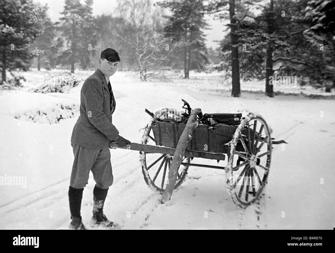 A young lumberjack at work in the snow Circa 1943 Stock Photo - Alamy