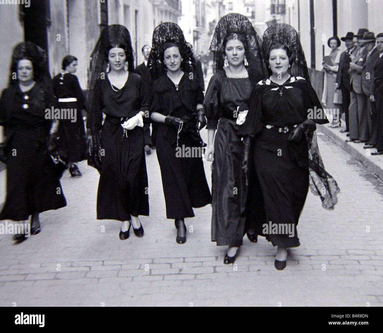 Four ladies of Seville Spain wearing black dresses Circa 1935 Stock ...