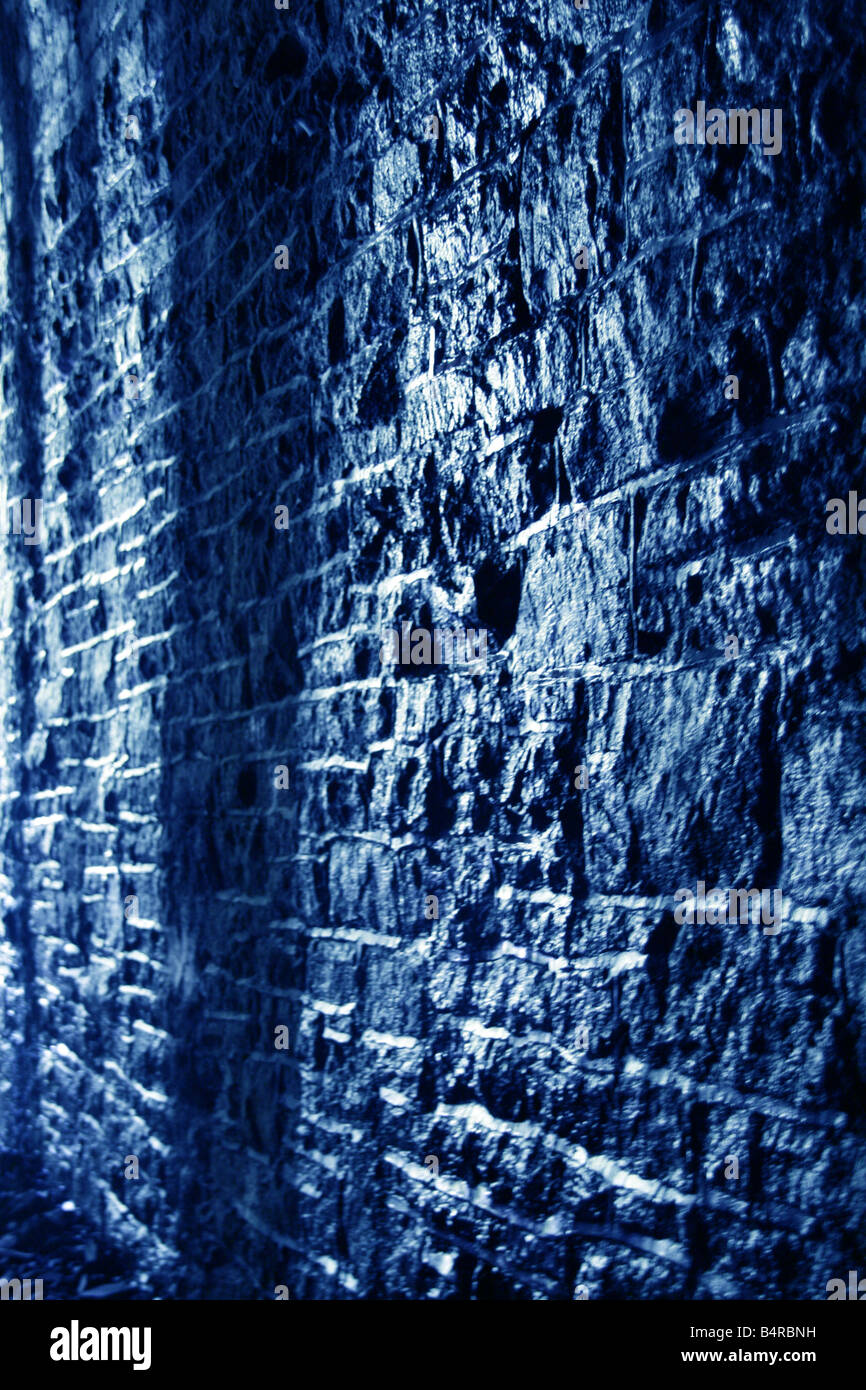 detail of dark damp wet stone wall in alley way Stock Photo - Alamy
