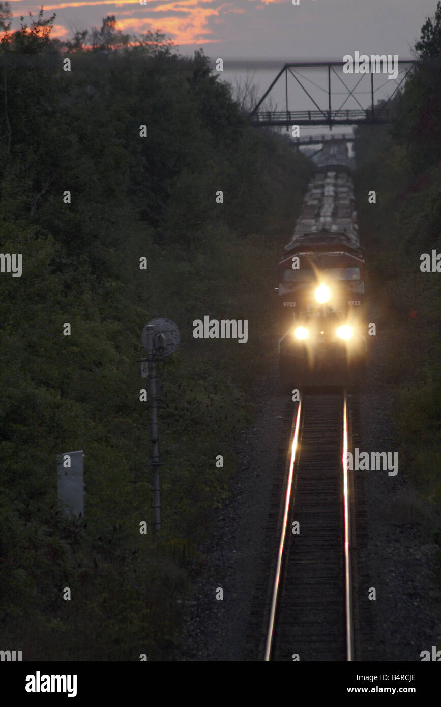 Approaching Freight Train at Sunset Under Truss Bridge Ontario Canada ...