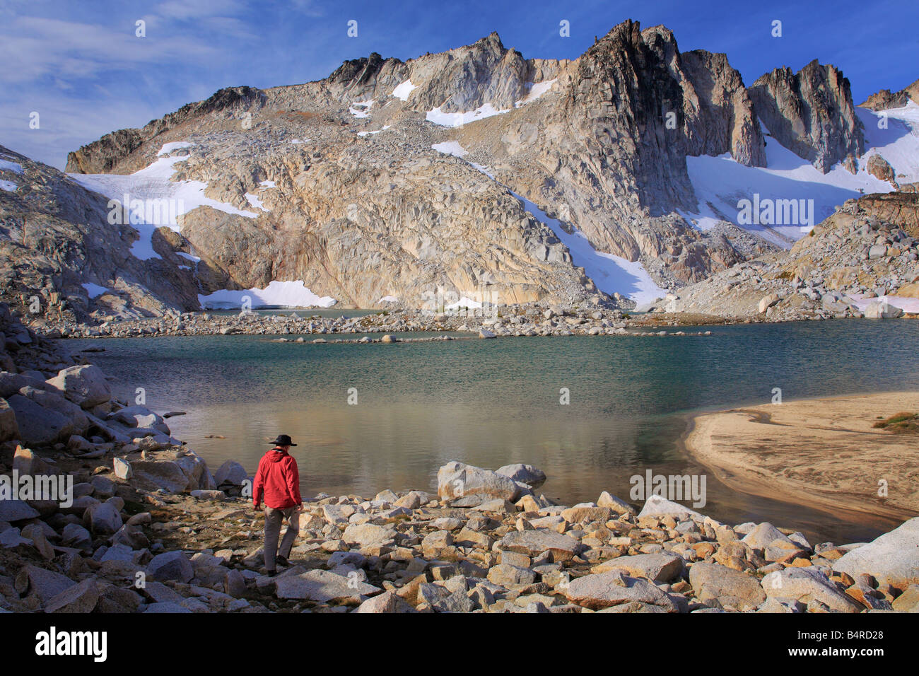 Hiker at Isolation Lake in the Upper Enchantment Lakes area of the ...