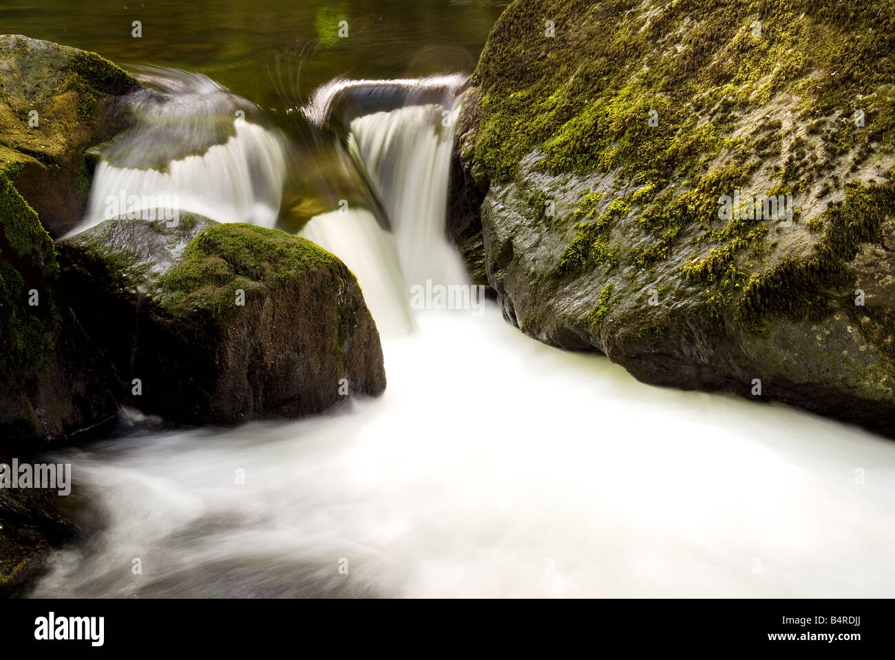 water over rocks Stock Photo - Alamy