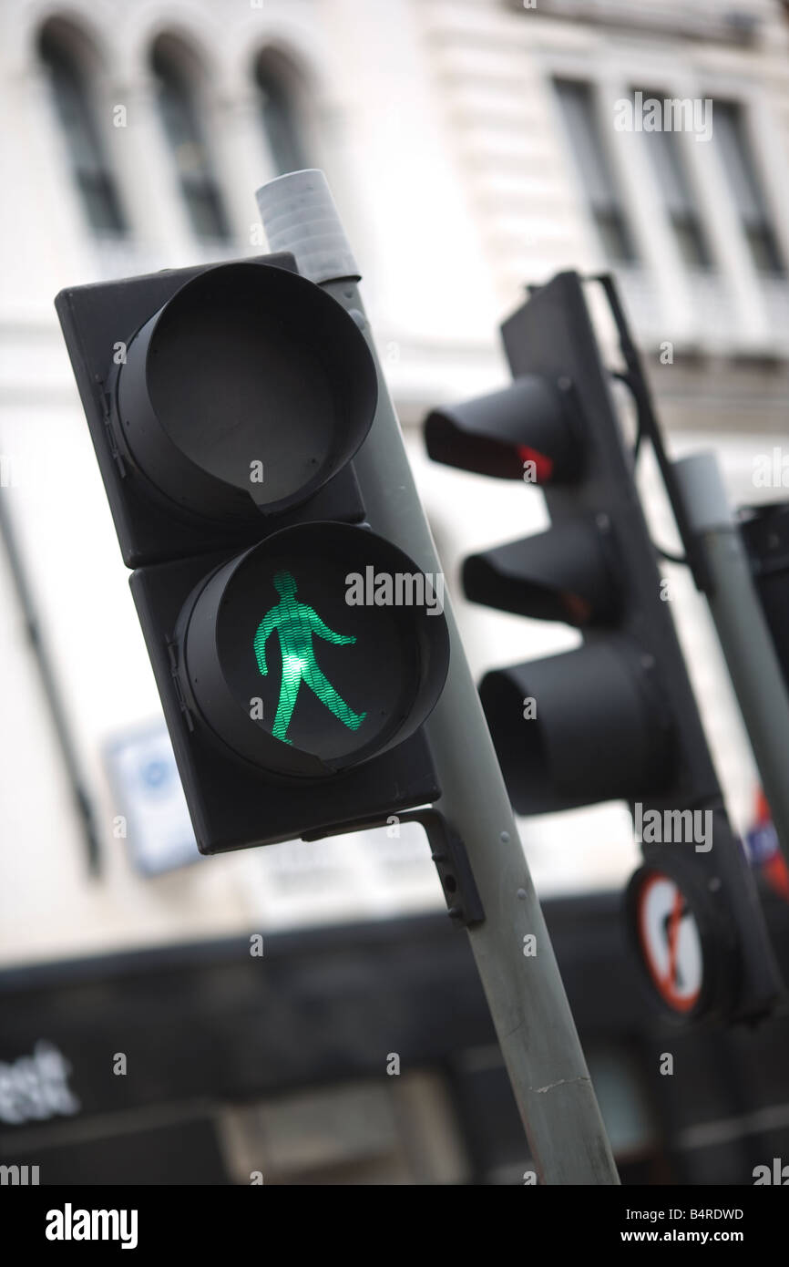 Walk signal at a pedestrian crossing in the United Kingdom Stock Photo ...