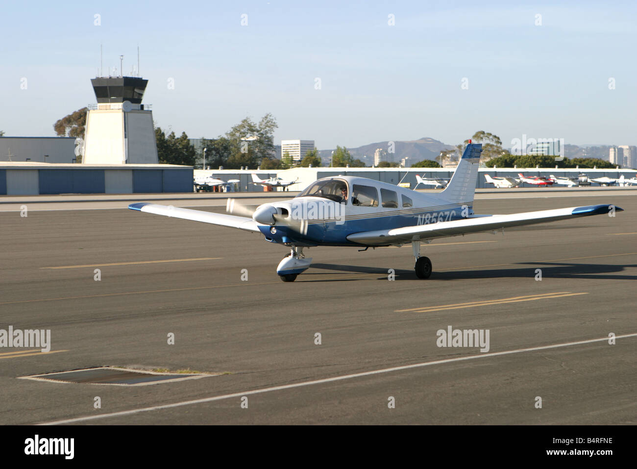 Airplane on runway Stock Photo - Alamy
