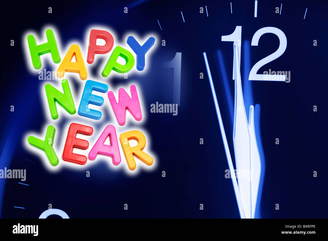 Clock Face and Happy New Year Greetings Stock Photo - Alamy