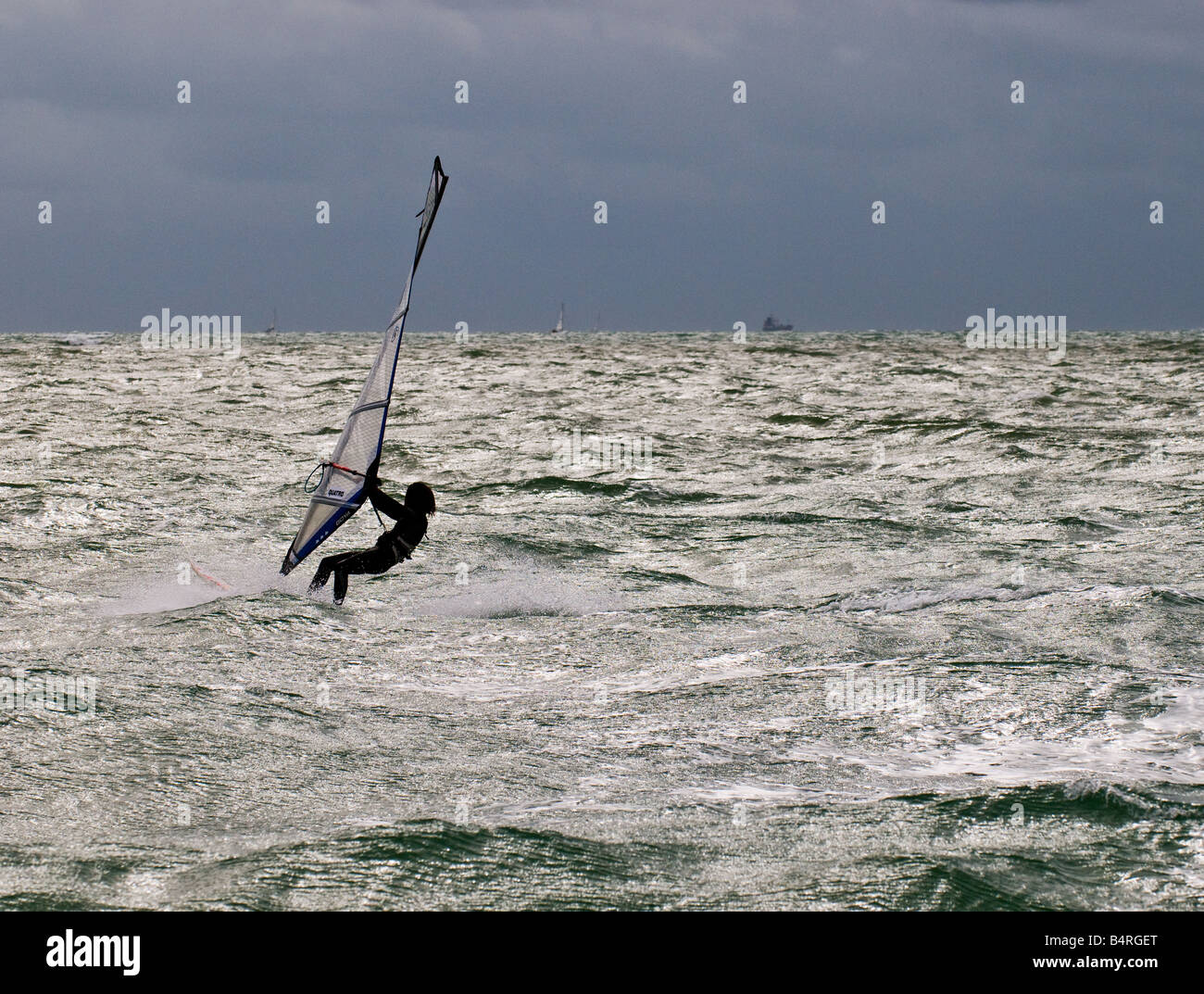 A windsurfer in the Solent Stock Photo - Alamy