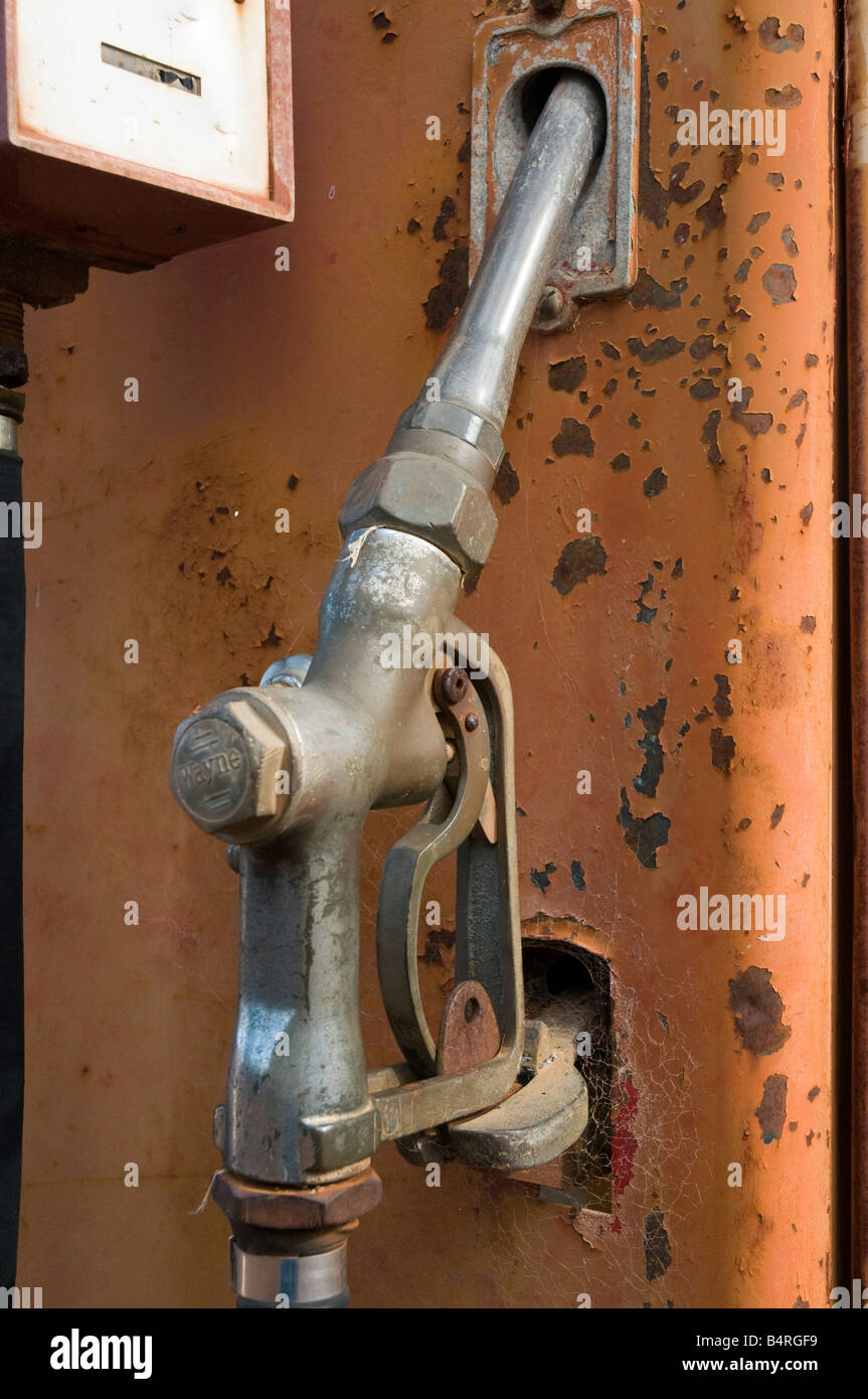 Old rusting fuel pump with spiderwebs growing on the nozzle Stock Photo ...
