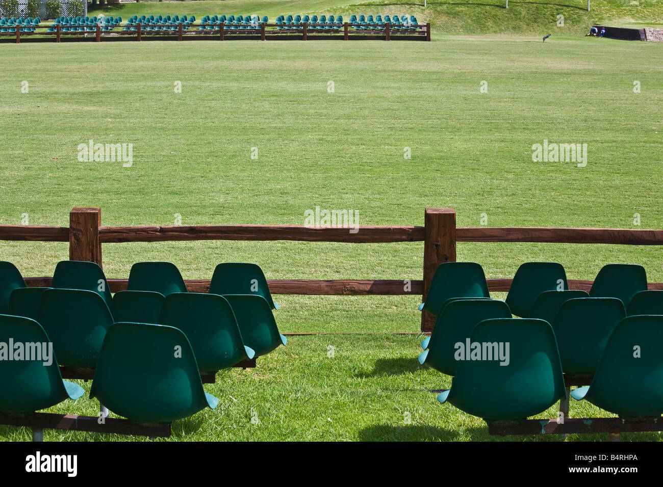 Empty arena seating and lawn Stock Photo - Alamy