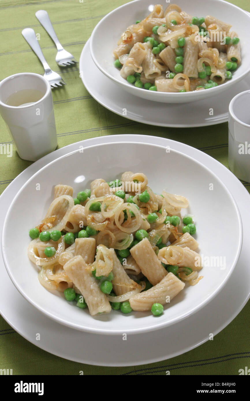 Rigatoni wholemeal pasta with creamed onions and beans, Italy Stock ...