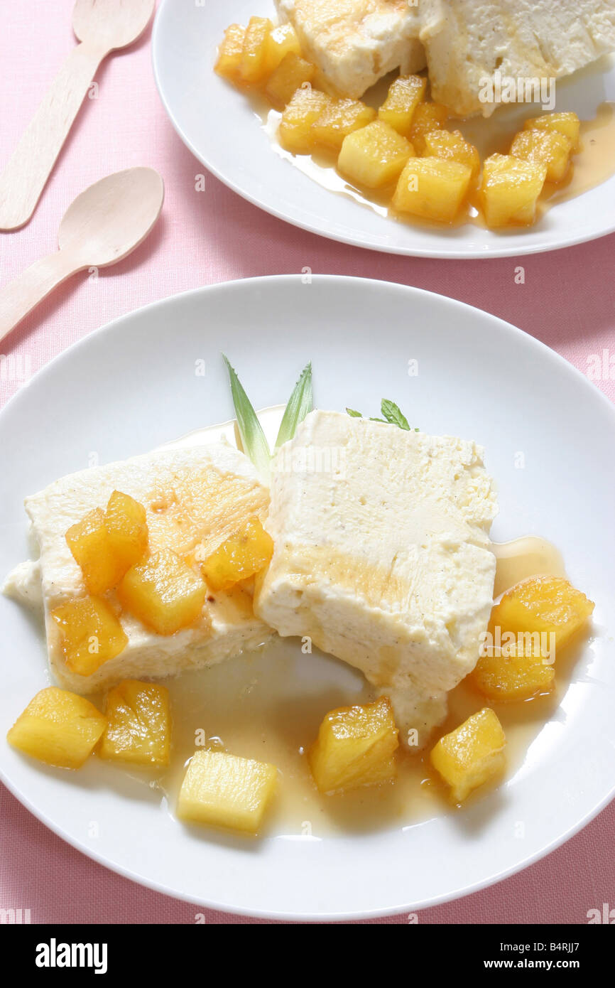 Semifreddo ginger ice cream with caramel coated pineapple, Italy Stock ...