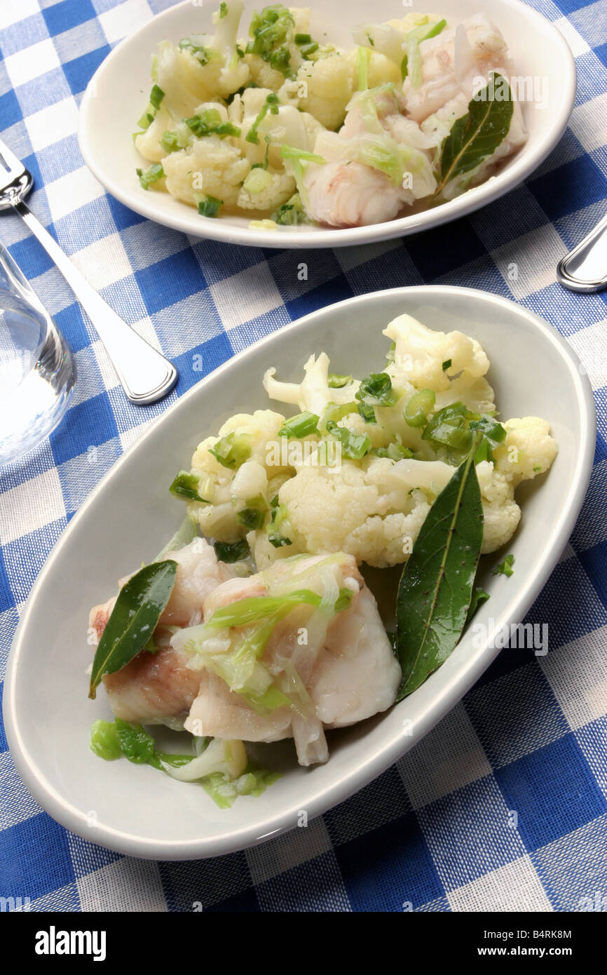 Angler fish with cauliflower and onions Italy Stock Photo - Alamy