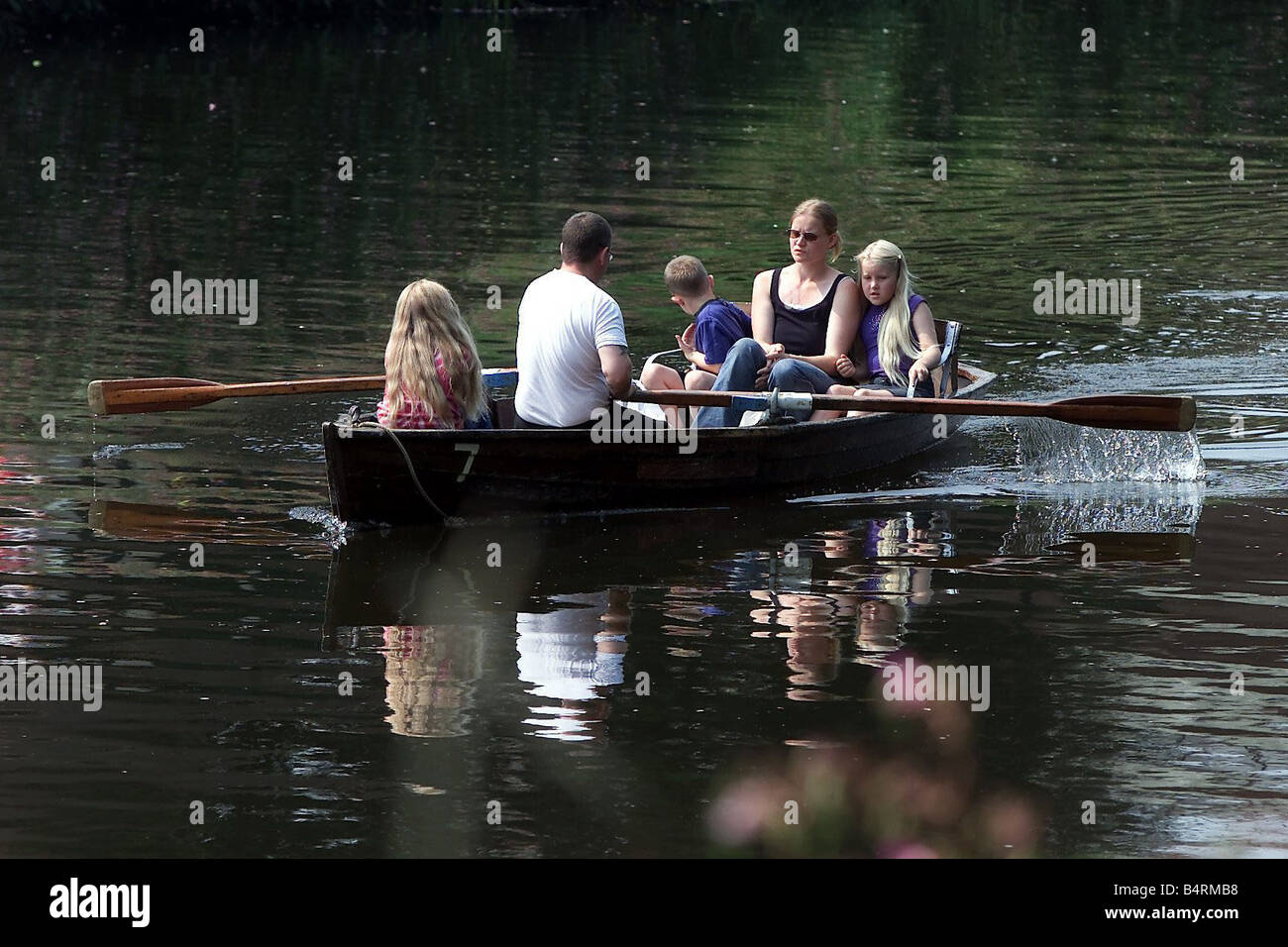 A Family enjoying boating on the river as seen from Baths Bridge in ...