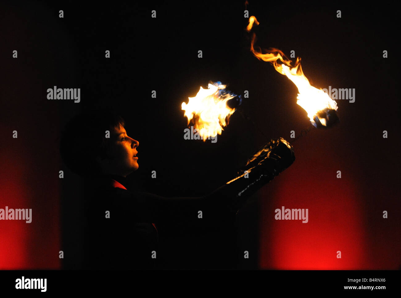 Woman dancing with firing torch Stock Photo - Alamy