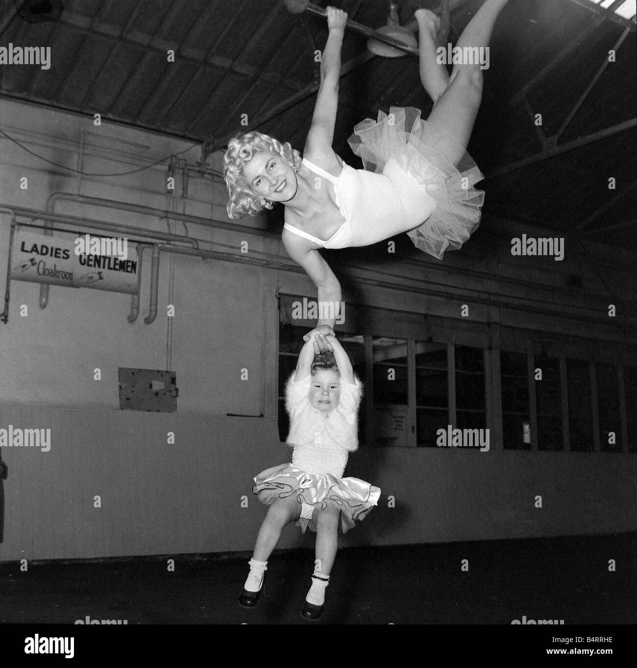 Billy Smart s Circus Trapeze artists flying through the air December ...