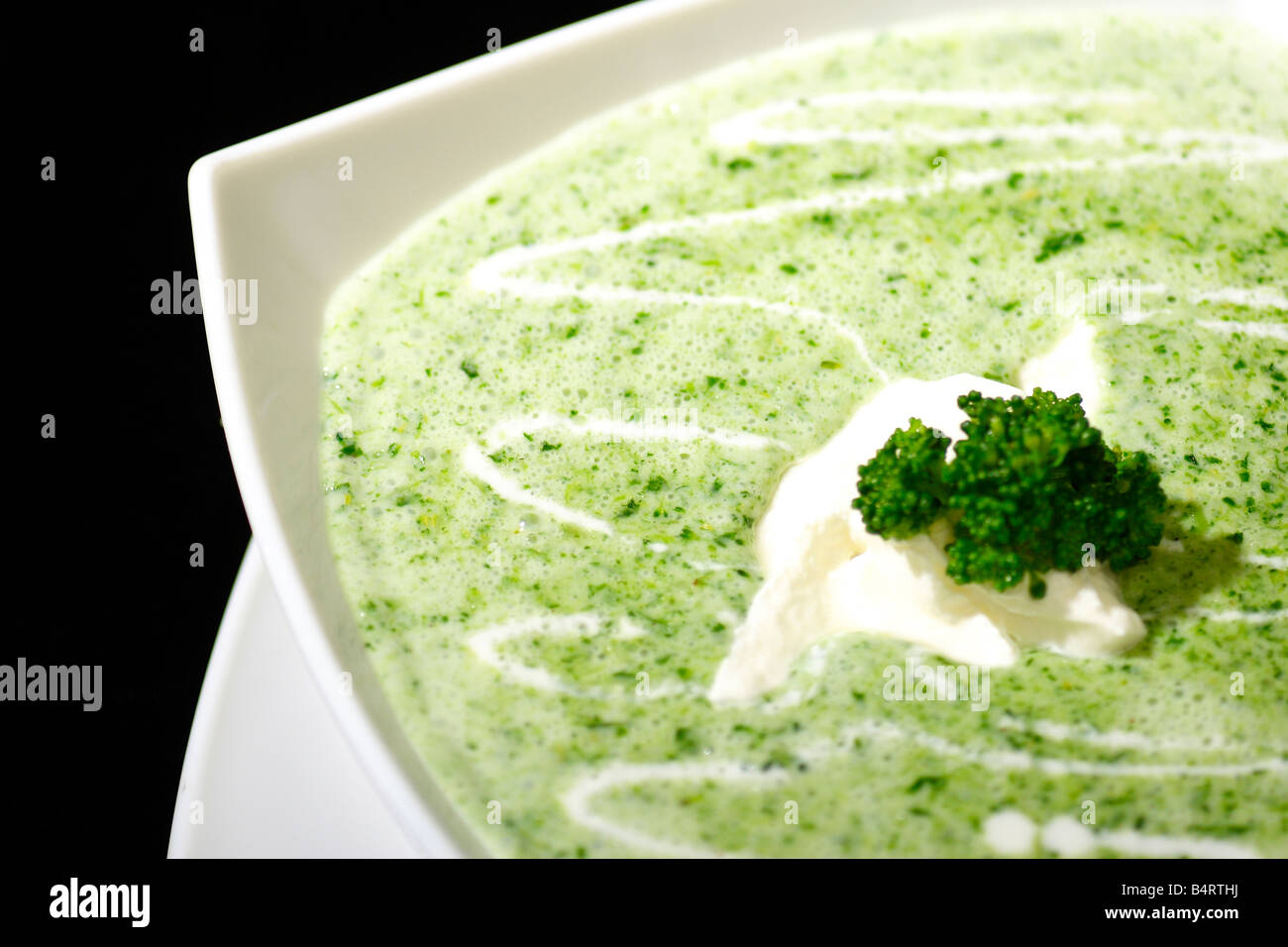 close up photograph cream of broccoli soup Stock Photo - Alamy