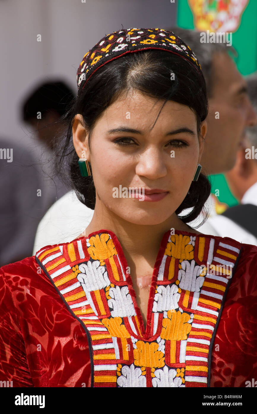 Turkmen girl welcoming delegates of international conference at visit ...
