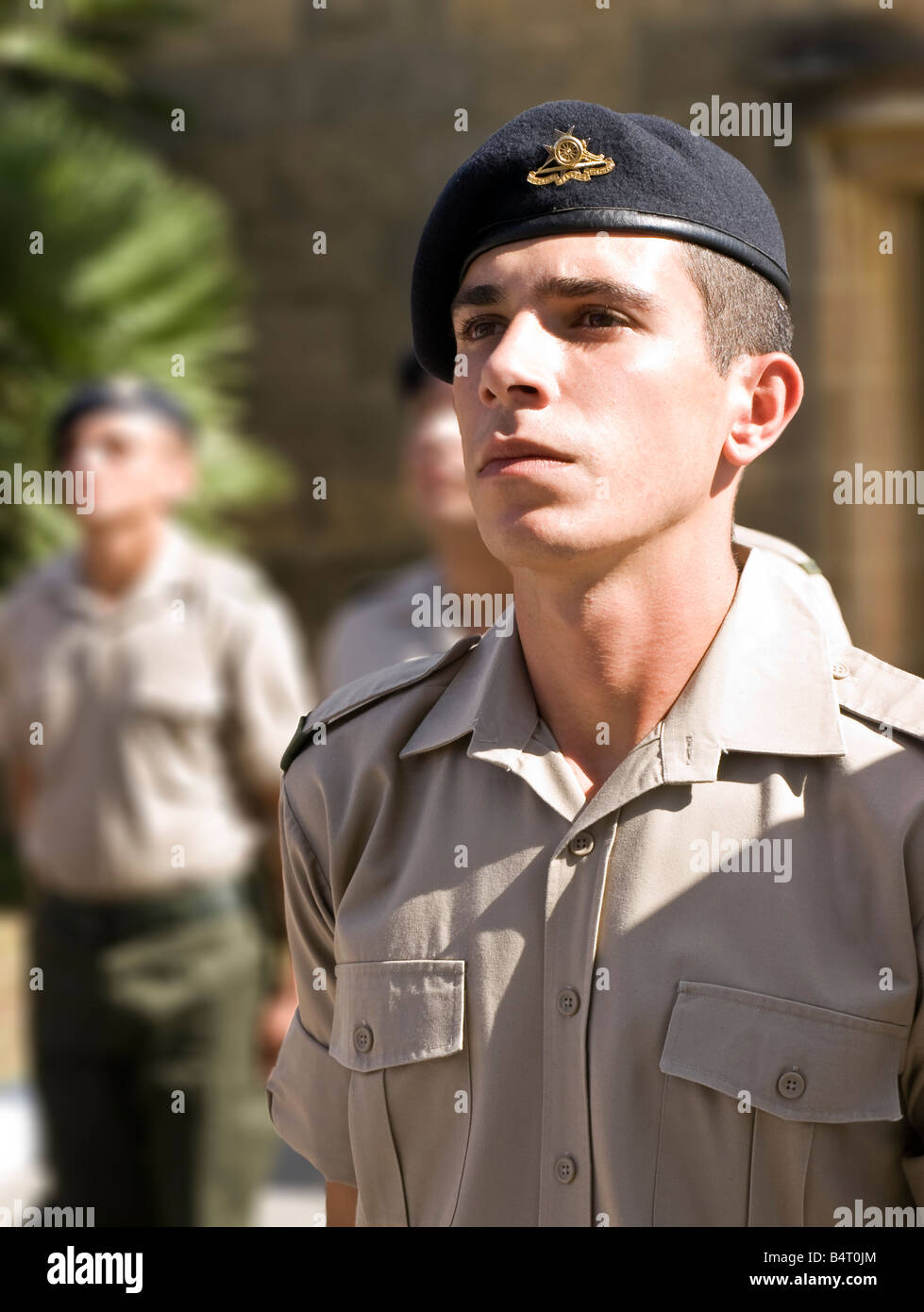 Recruit for the Armed Forces of Malta stands at attention Stock Photo ...