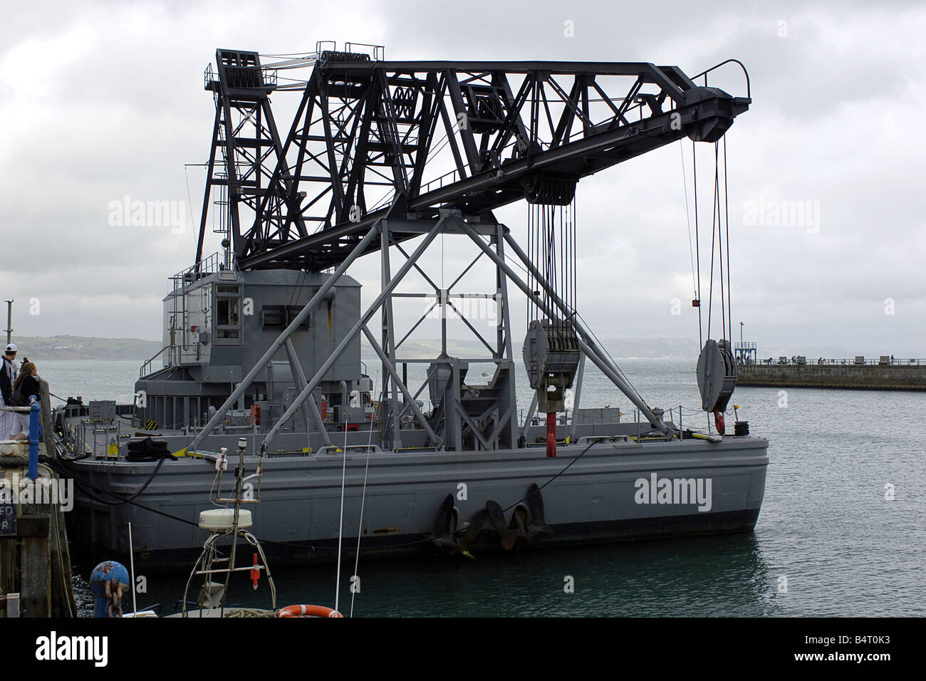 A USNavy Floating barge with a recovery crane used for salvaging sunken ...