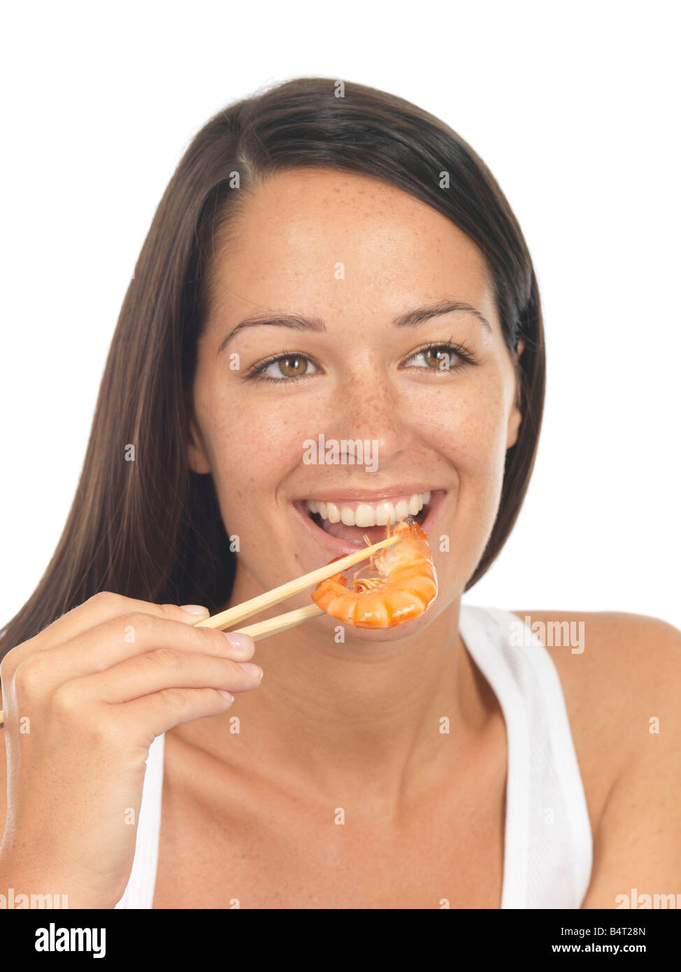 Young Woman Eating a Prawn Model Released Stock Photo - Alamy