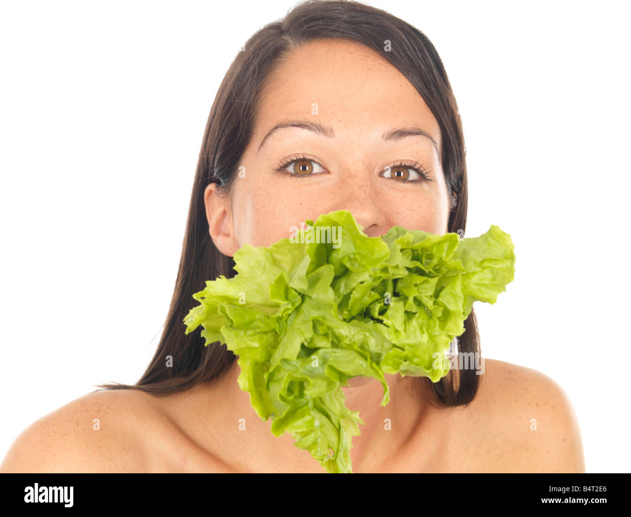 Young Woman Eating Lettuce Model Released Stock Photo - Alamy