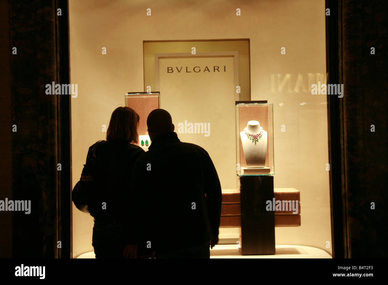 couple window shopping at bulgari in rome italy at night Stock Photo ...