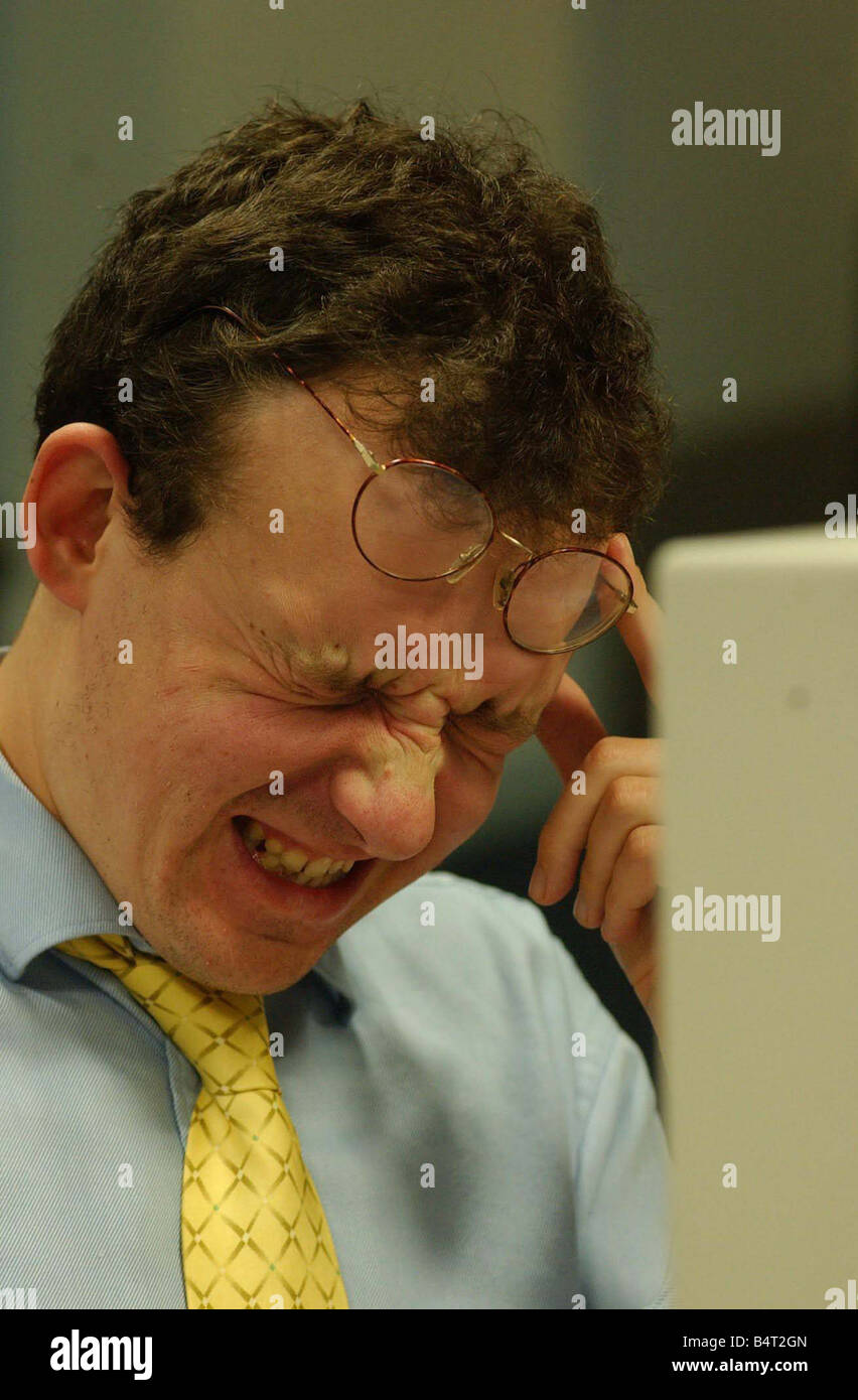 An office worker under stress Stock Photo - Alamy