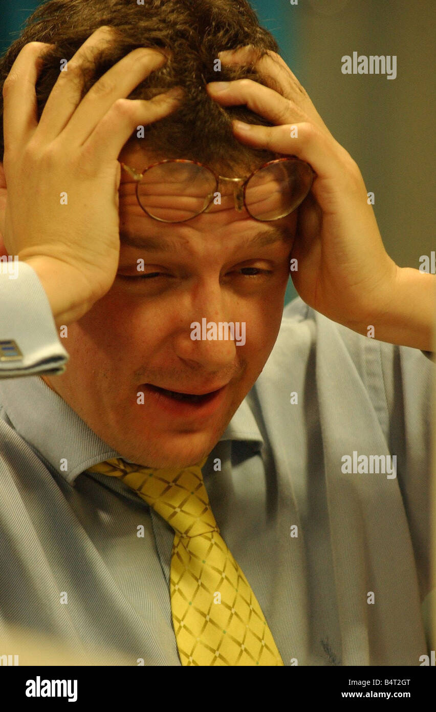 An office worker under stress Stock Photo - Alamy