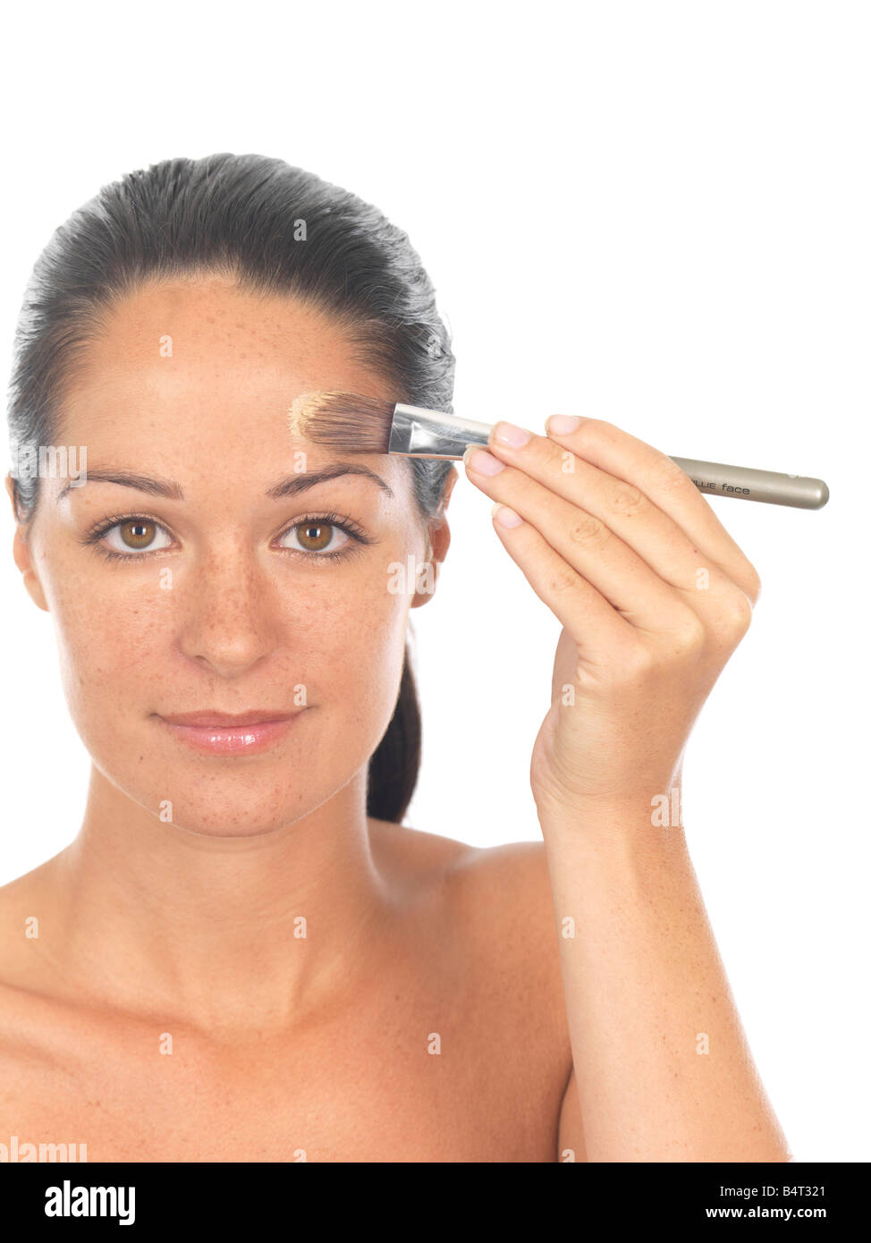 Woman Applying Foundation Model Released Stock Photo - Alamy