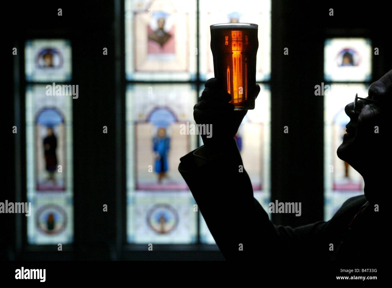 A man with a pint of beer Stock Photo - Alamy