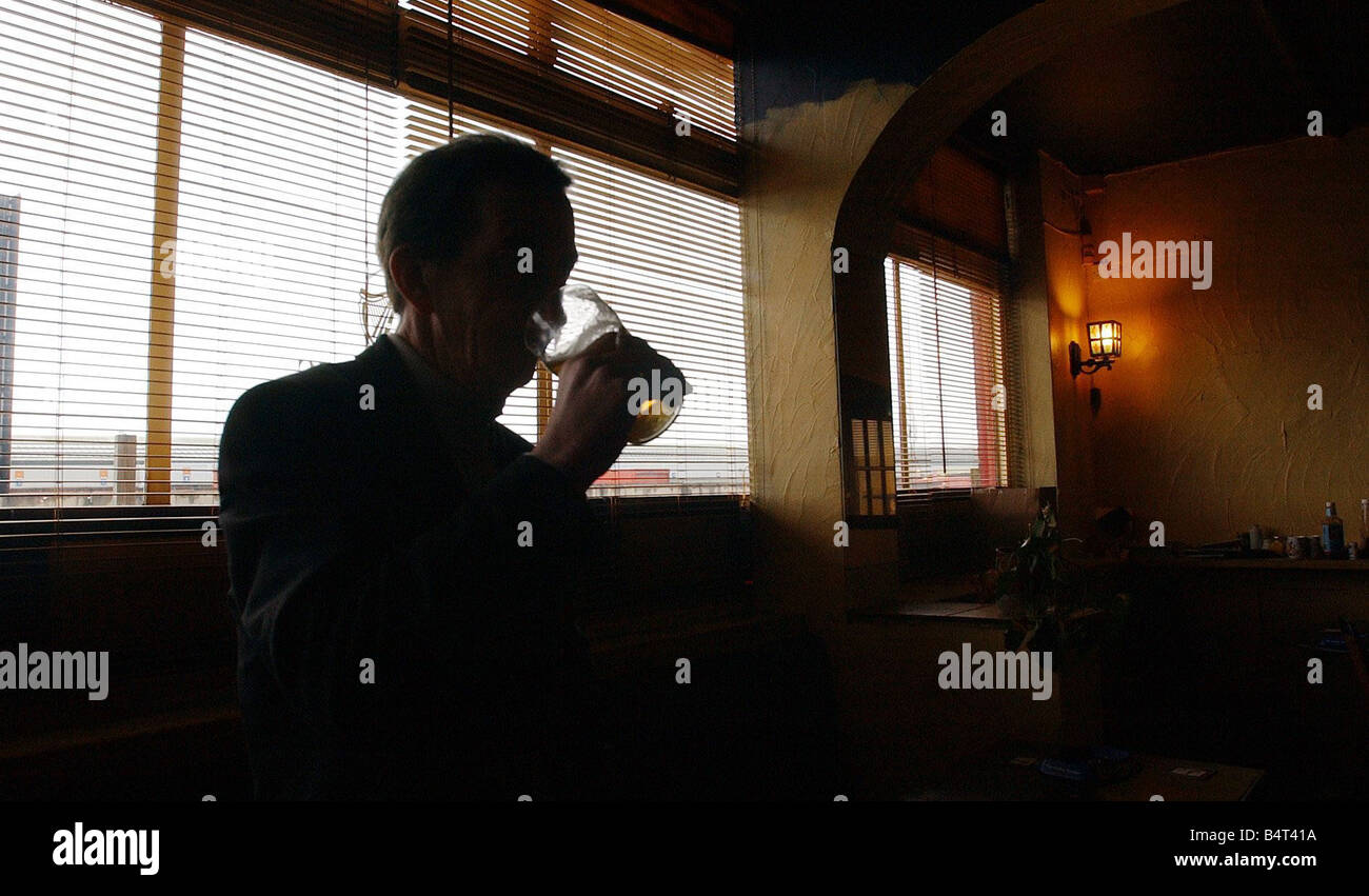Man drinking a pint of beer in The Old Railway pub Curzon Street ...